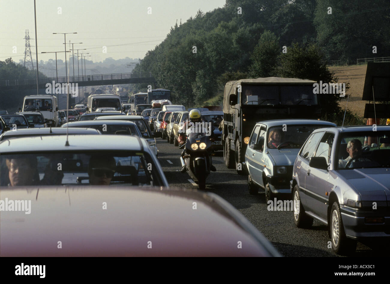 M1 Motorway traffic congestion lines of cars stuck in a traffic jam ...