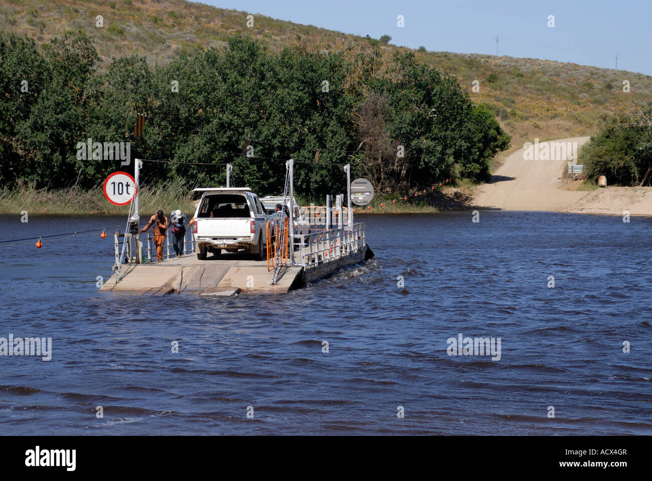 The famed man powered Malgas ferry takes three cars over the Breede ...
