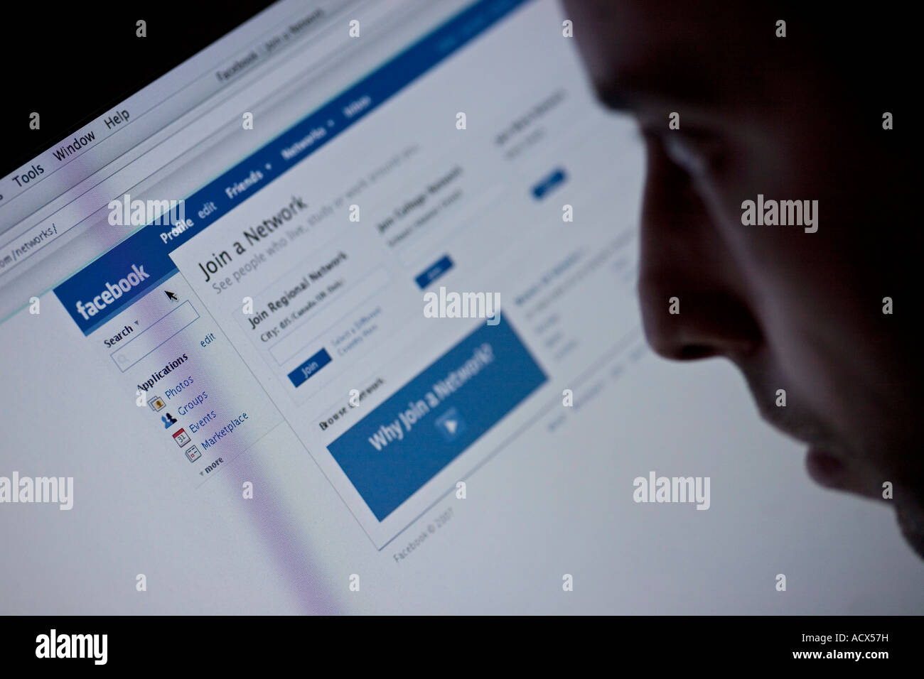 Facebook social community website being used by young man www.facebook ...