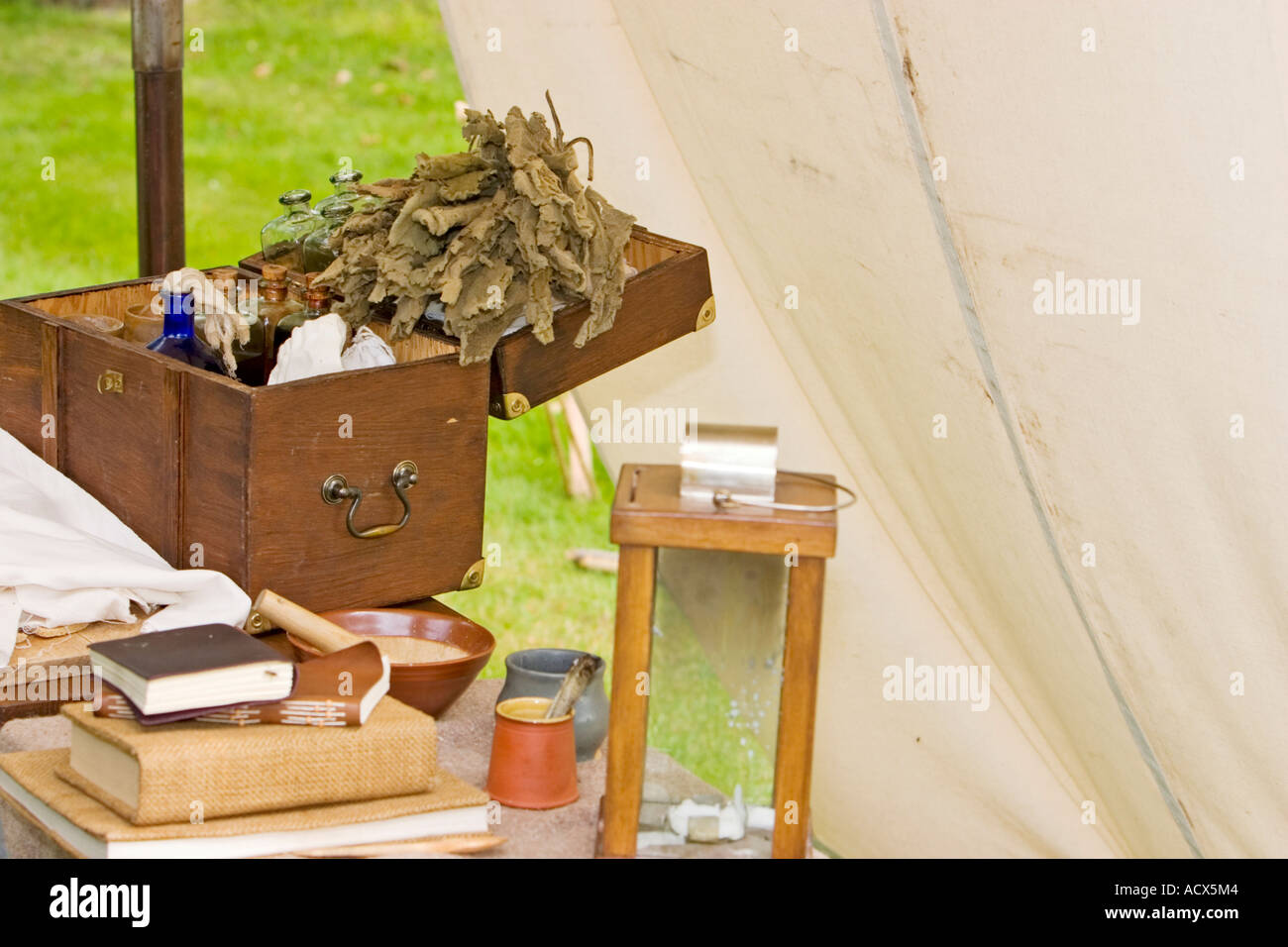 Traditional apothocary herbalist medicine table at medieval reenactment ...