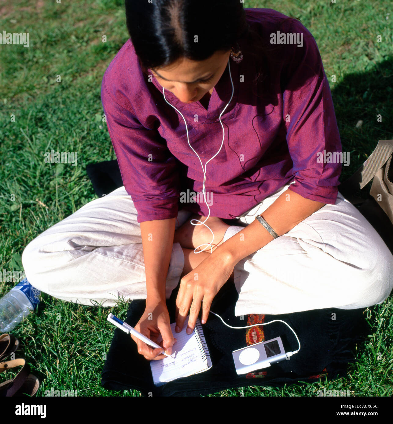 Tishani Doshi Indian poet young woman listening to an ipod sitting ...