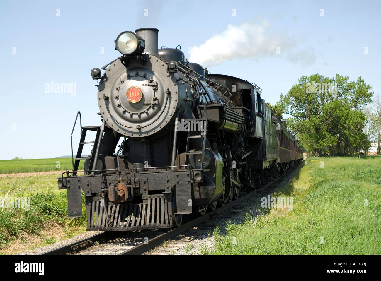 The Strasburg Rail Road locomotive 90 chugs down the tracks Stock Photo ...
