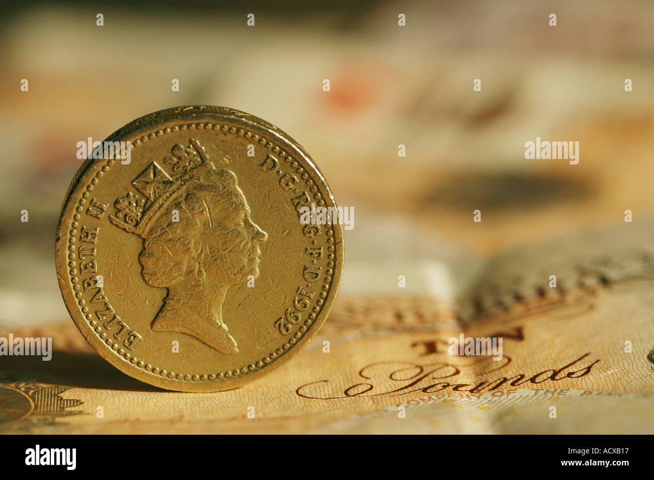 Pound Coin on Paper Money Stock Photo - Alamy