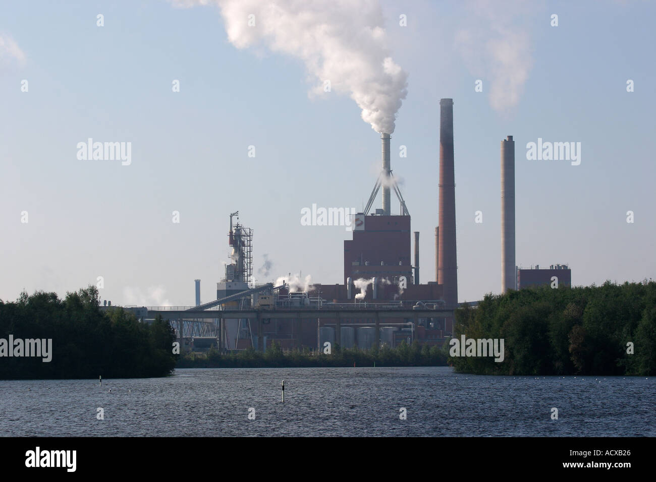 Smoke billowing from a pulp and paper factory Stock Photo - Alamy