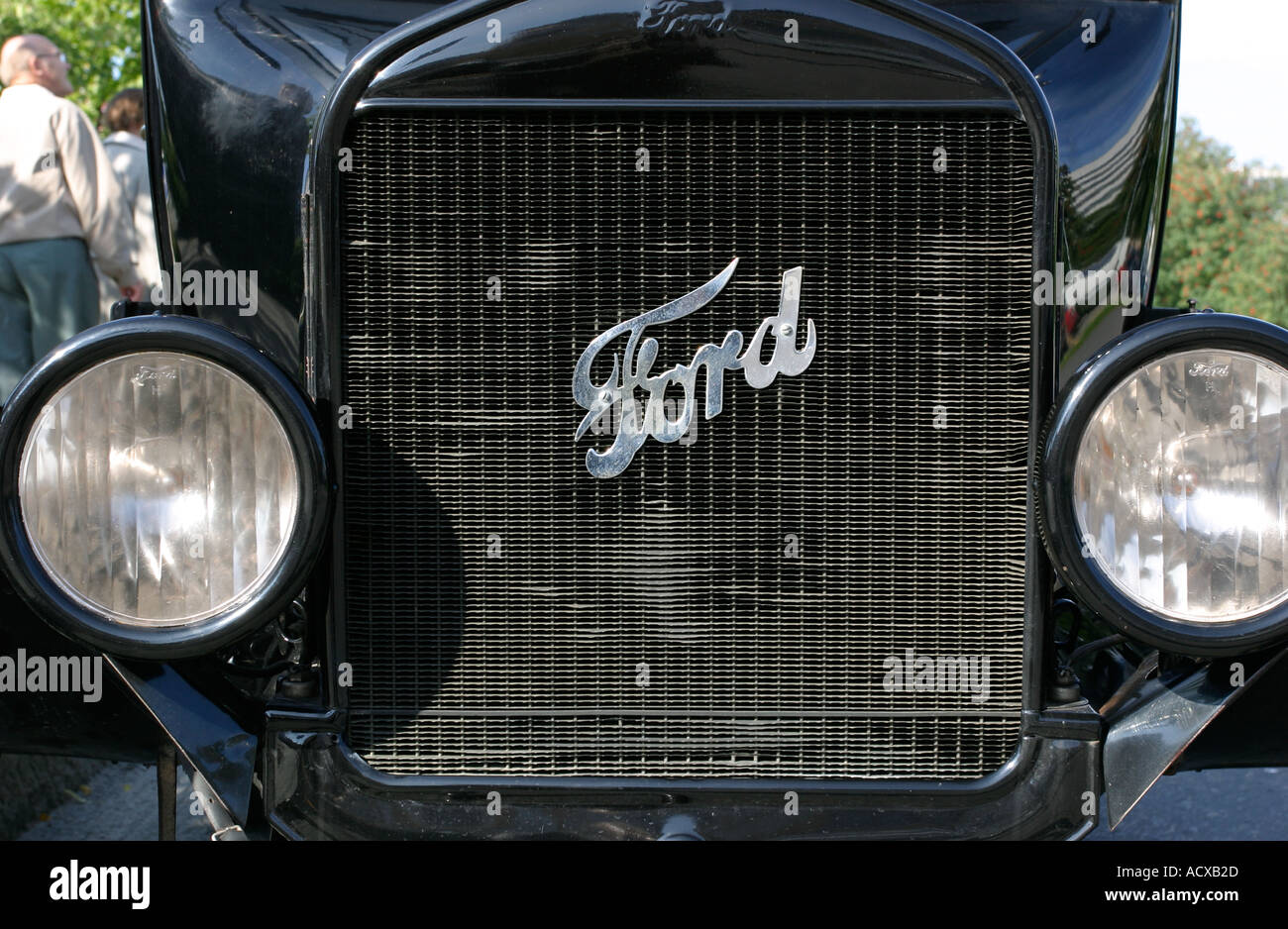 Ford sign and headlights Stock Photo - Alamy