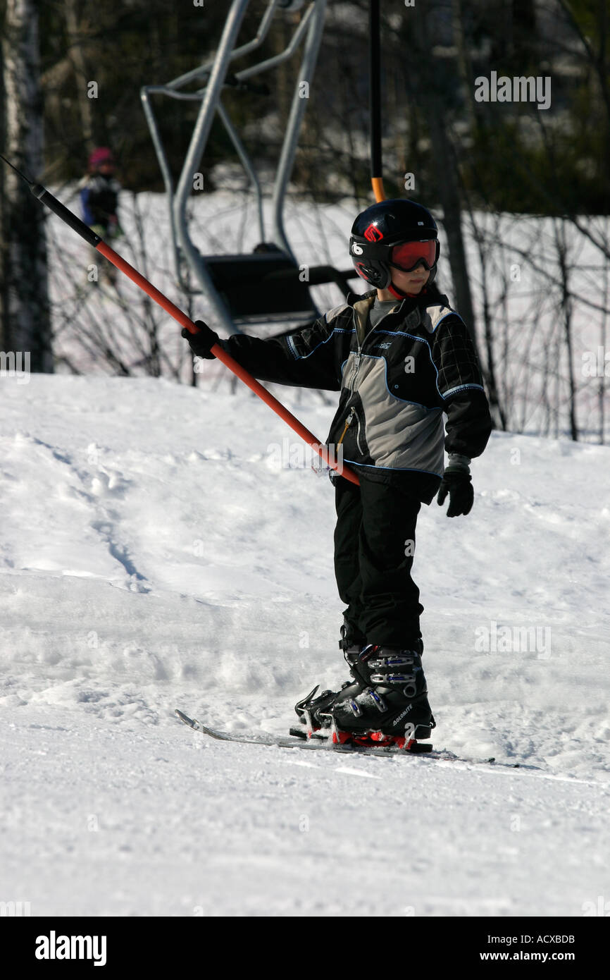 Child on ski lift Stock Photo - Alamy