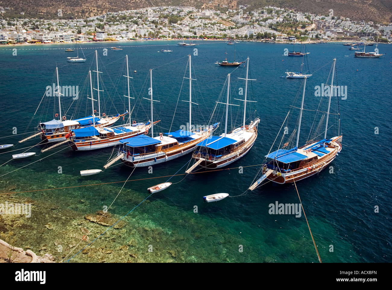 Turkish traditional wooden boats gulets anchored in front of Bodrum ...