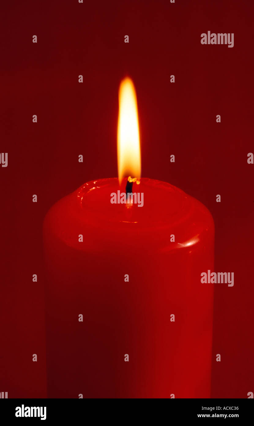 Candle in flame fire hi-res stock photography and images - Alamy