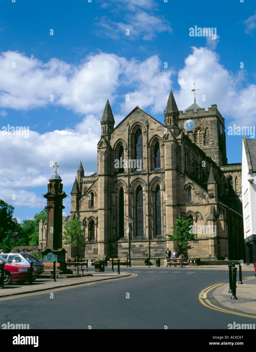 Market Cross and East facade of Hexham Abbey seen over the Market Place ...