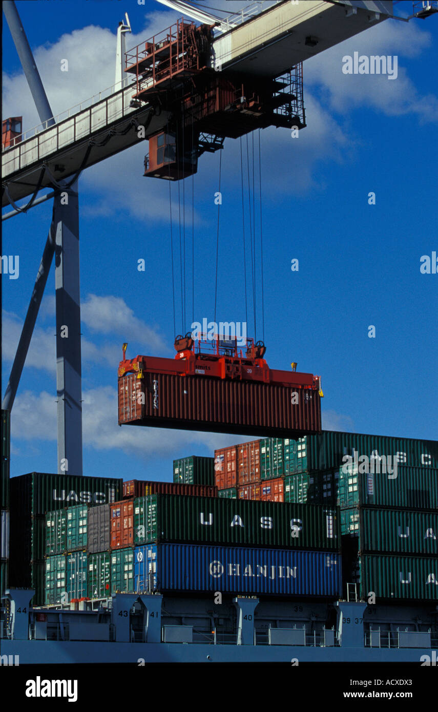Container loading in a harbor Stock Photo - Alamy