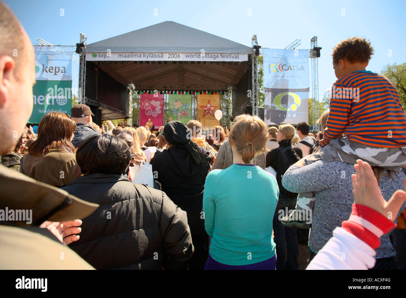 Crowd watching a band perform at World Village Festival at Kaisaniemi ...