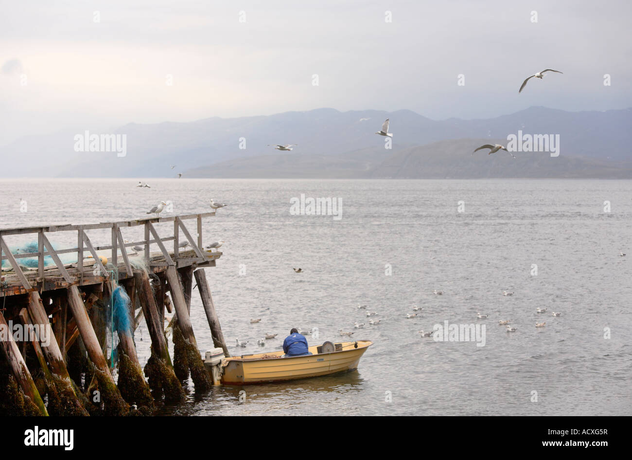 A wooden pier in Kvalsund Fjord, Finnmark county, Norway, Scandinavia ...
