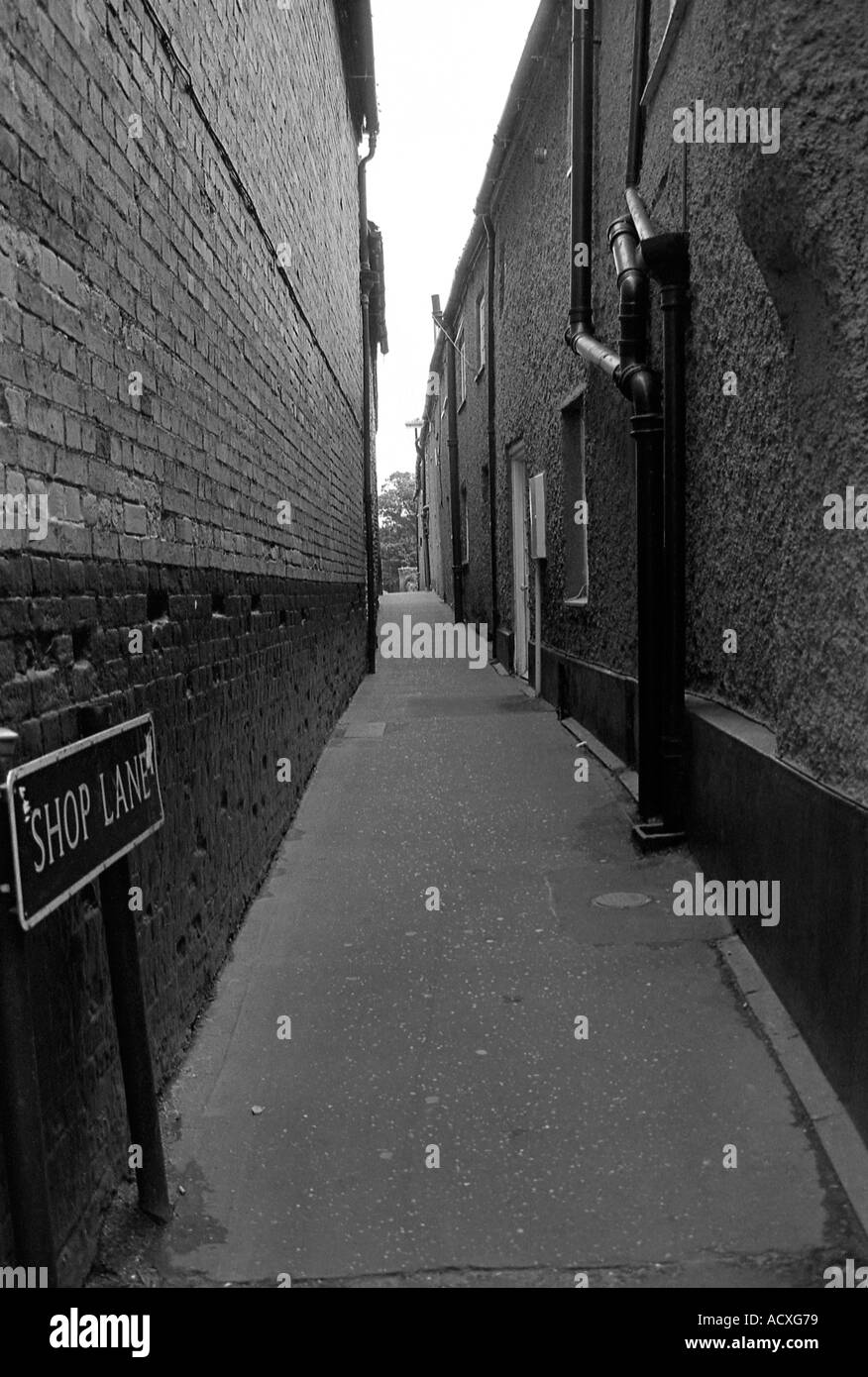 Passage between building Black and White Stock Photos & Images - Alamy