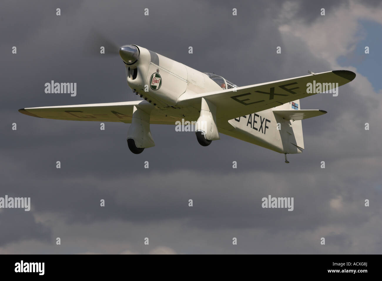 Percival Mew Gull G-AEXF in flight at Breighton Airfield, West ...