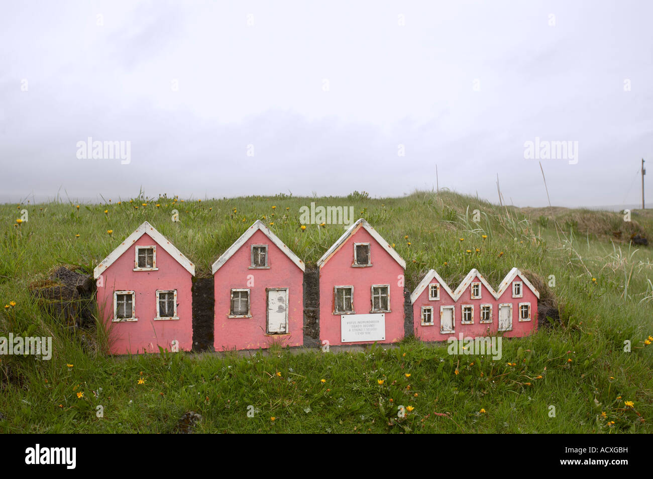 Miniature false house fronts in the cemetary of Strandarkirkja church ...