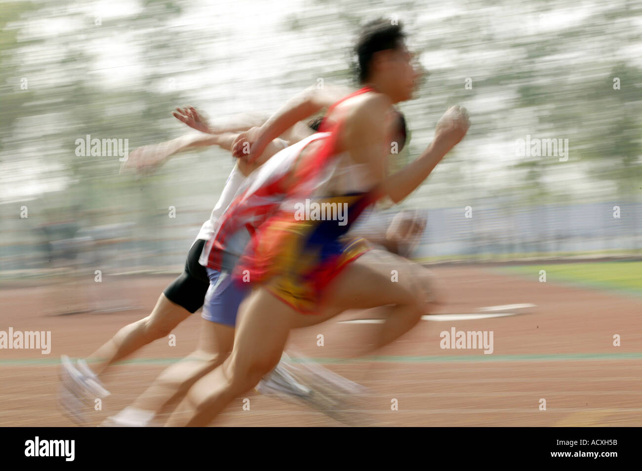 a group of athlete running towards finish lin Stock Photo - Alamy