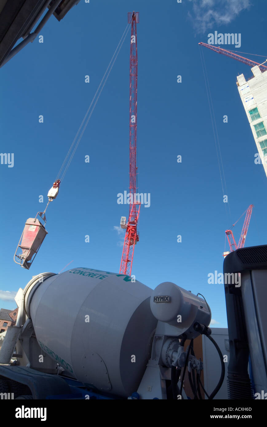 cement mixer with crane lifting cement Stock Photo - Alamy