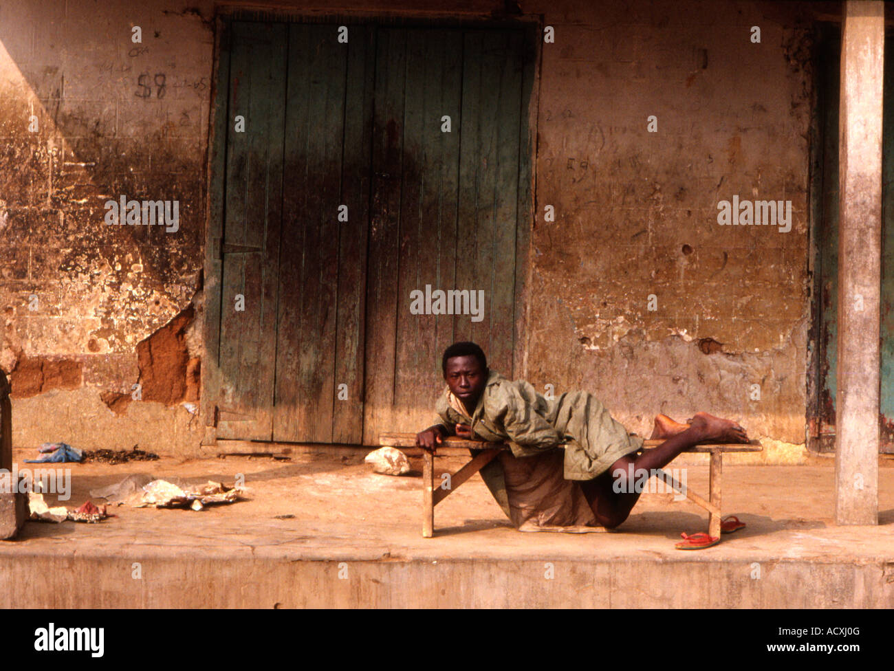 Boy in front of home in village in Ghana West Africa Stock Photo - Alamy