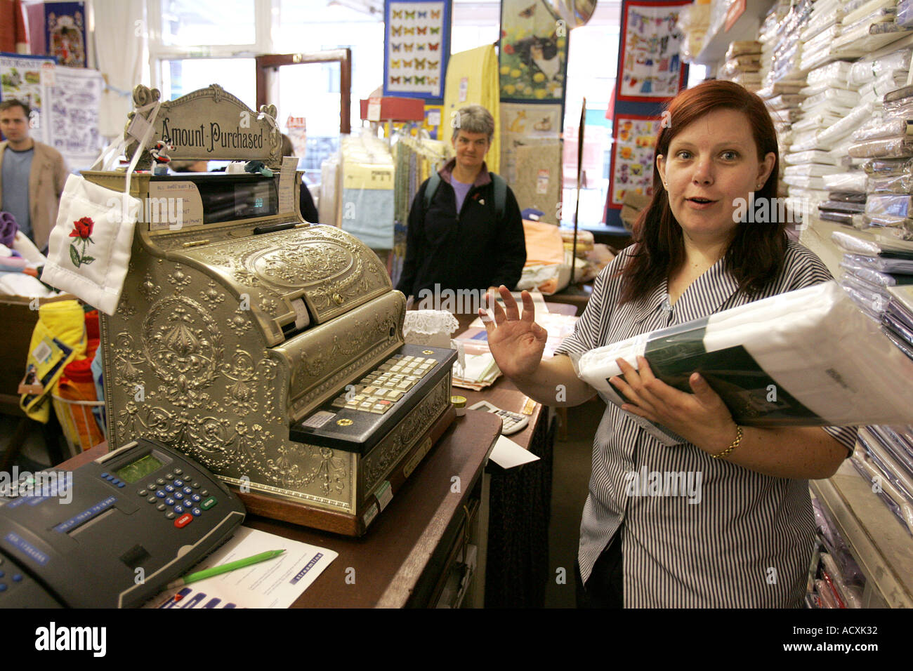 Woman shopping at haberdashery stall hi-res stock photography and ...