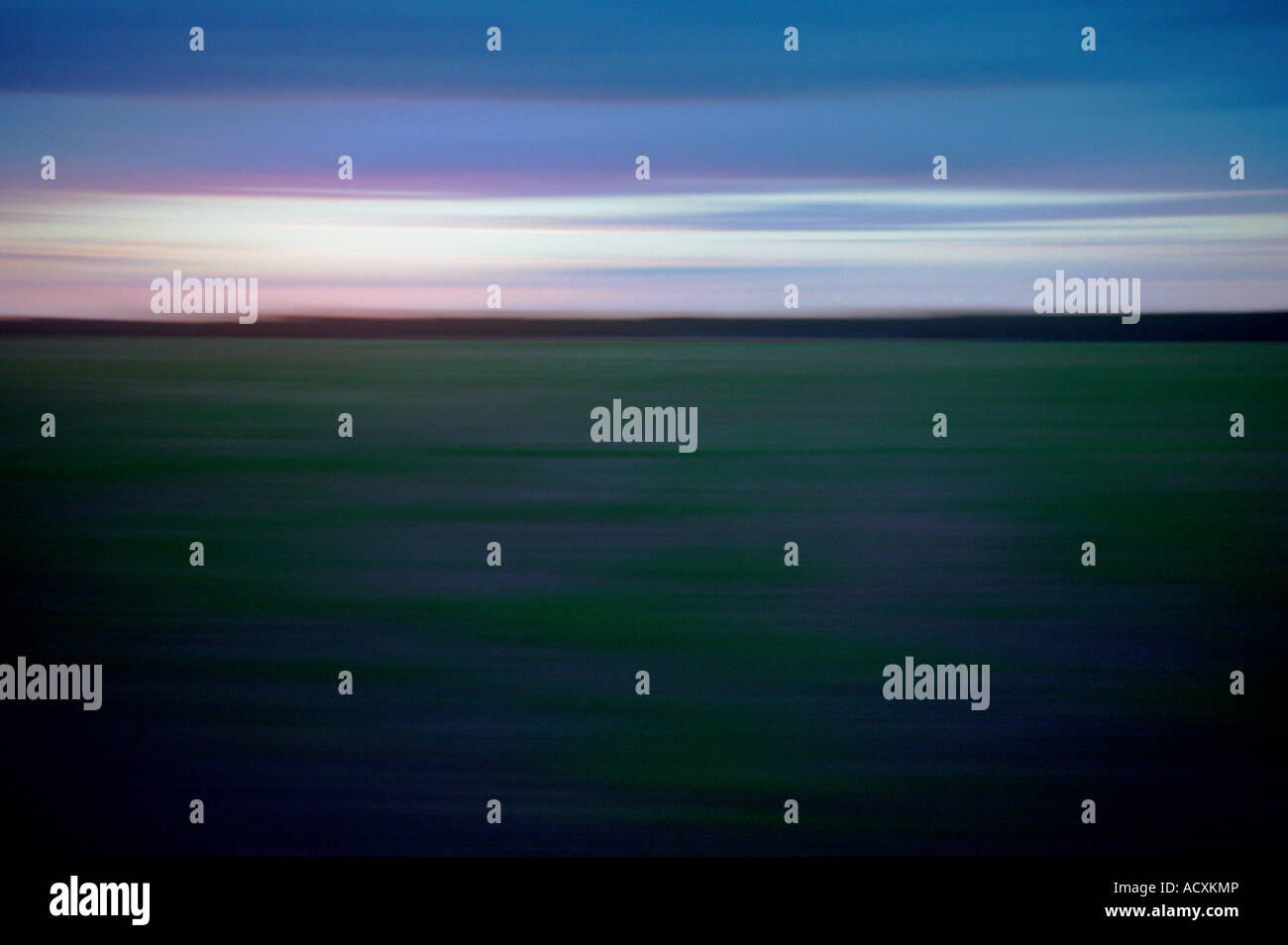 Blurry landscape at sunset Stock Photo - Alamy