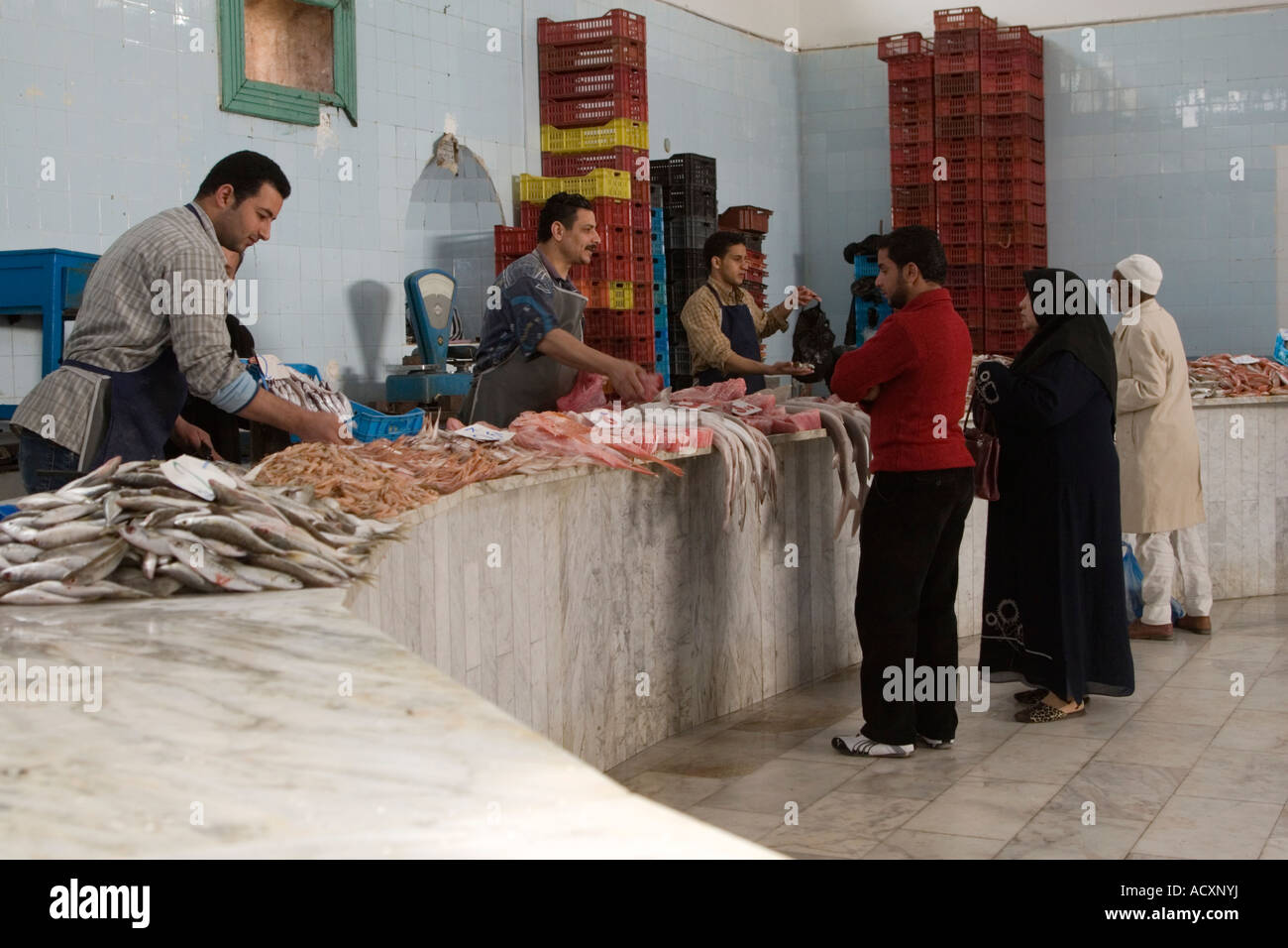 Tripoli, Libya. Fish Market, Rashid Street. Woman Wearing Abaya Stock ...