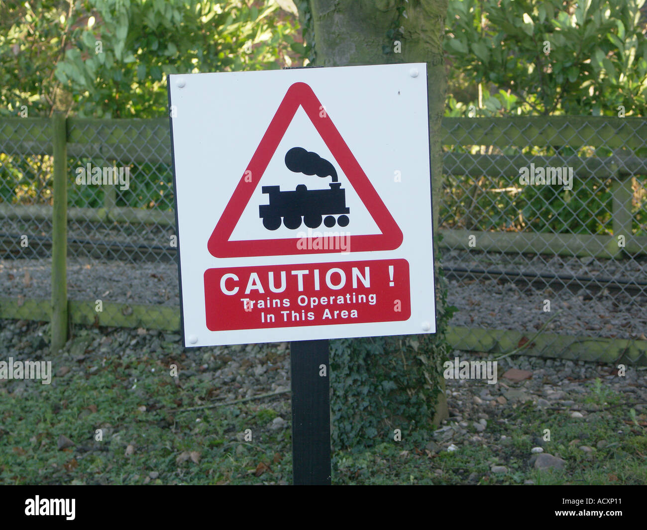 Caution Trains Sign Stock Photo - Alamy