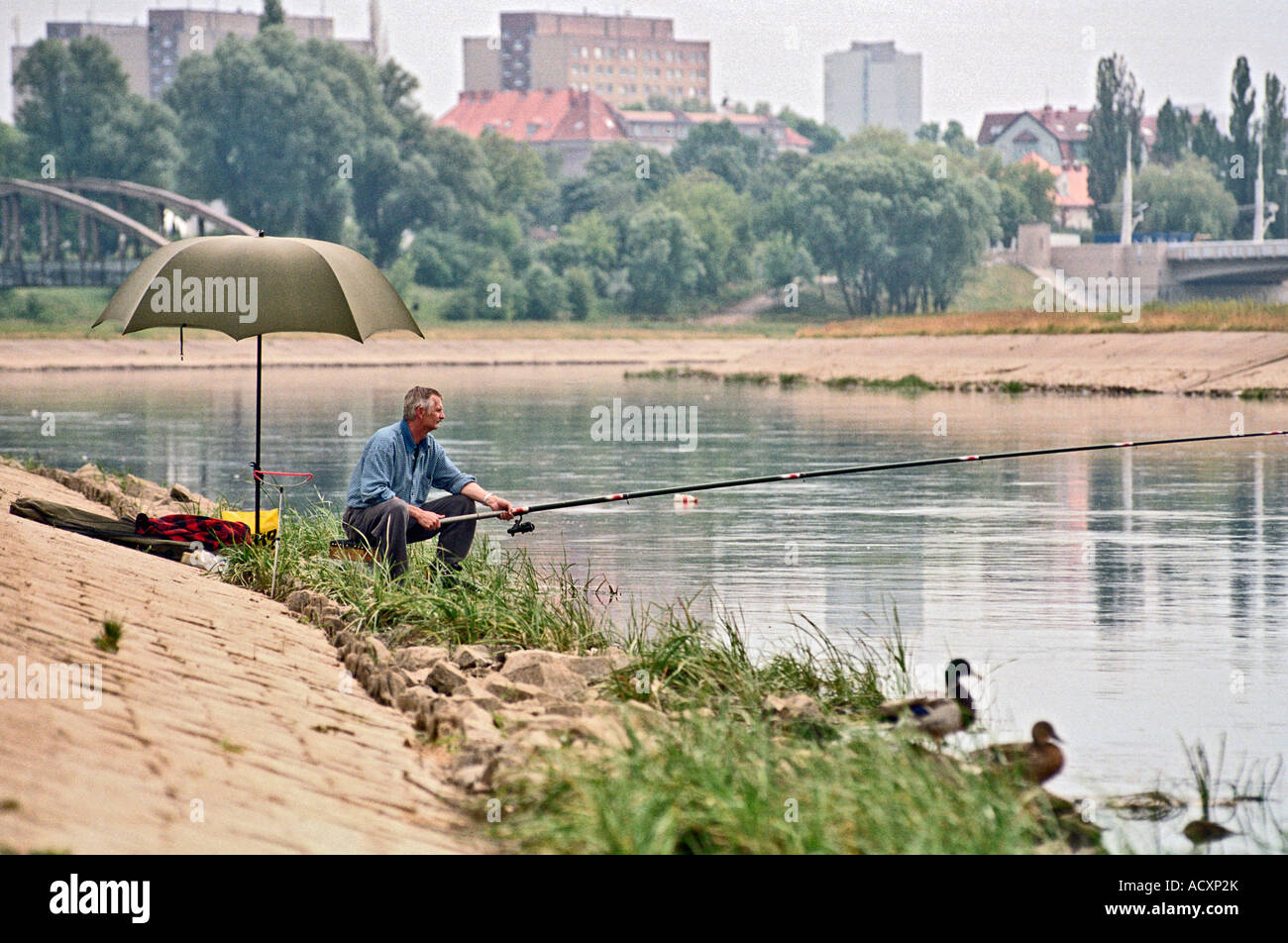 Man fishing at the Warta river in Poznan, Poland Stock Photo - Alamy