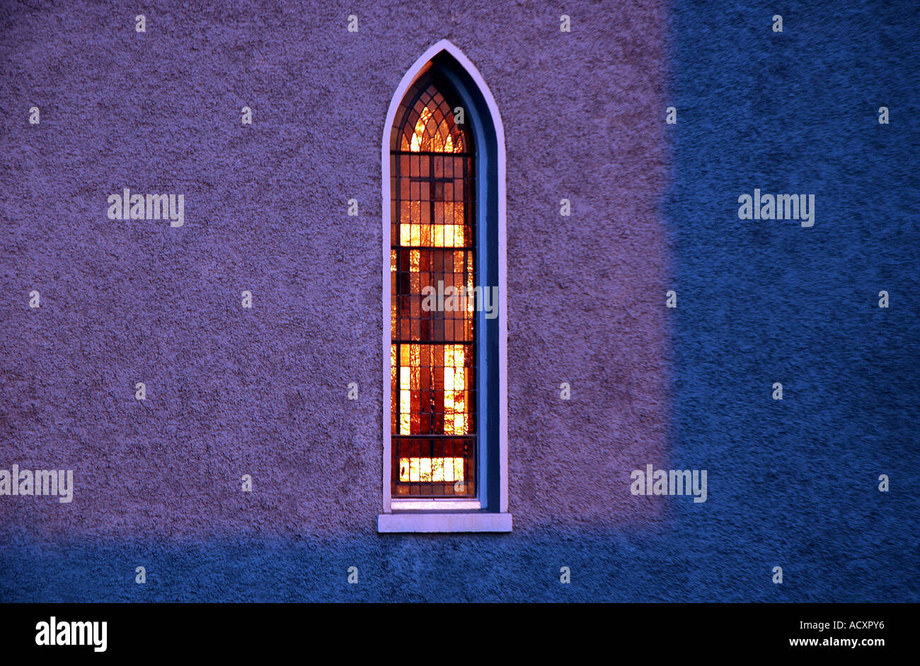 Sun reflected in church window Stock Photo - Alamy