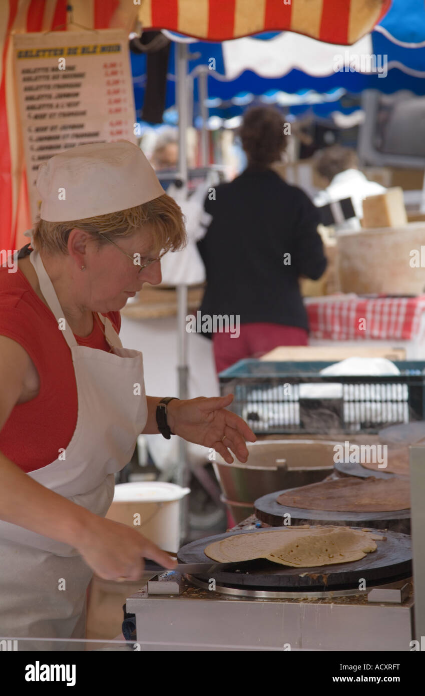 Traditional crepe making at Dinan market Brittany France Stock Photo ...