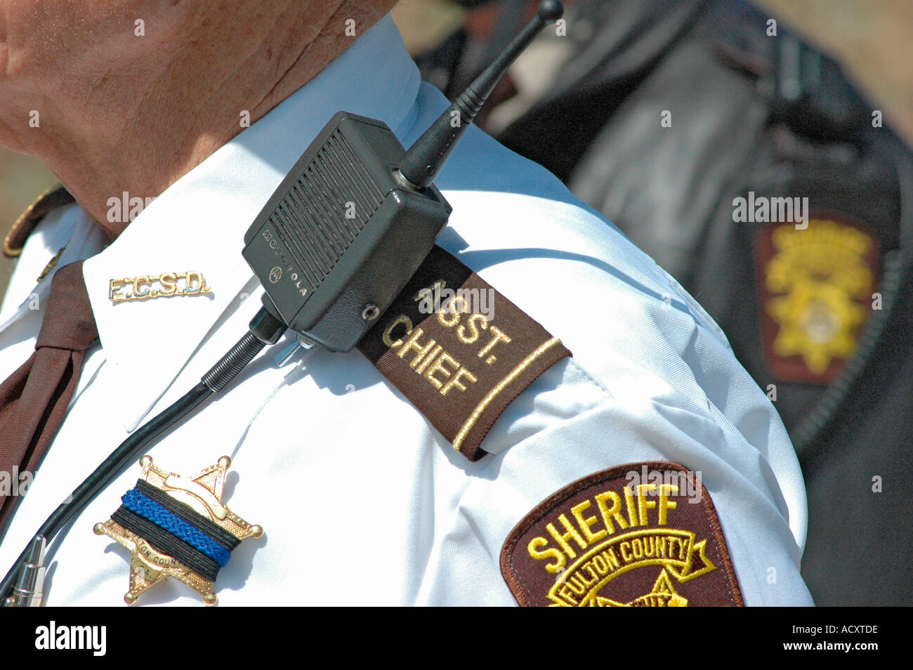 ID patches and badges and cuffs from police uniforms in the Atlanta ...