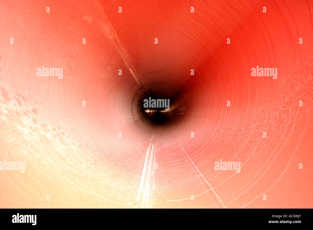 looking down the inside of a gas pipe that is going to be part of the ...