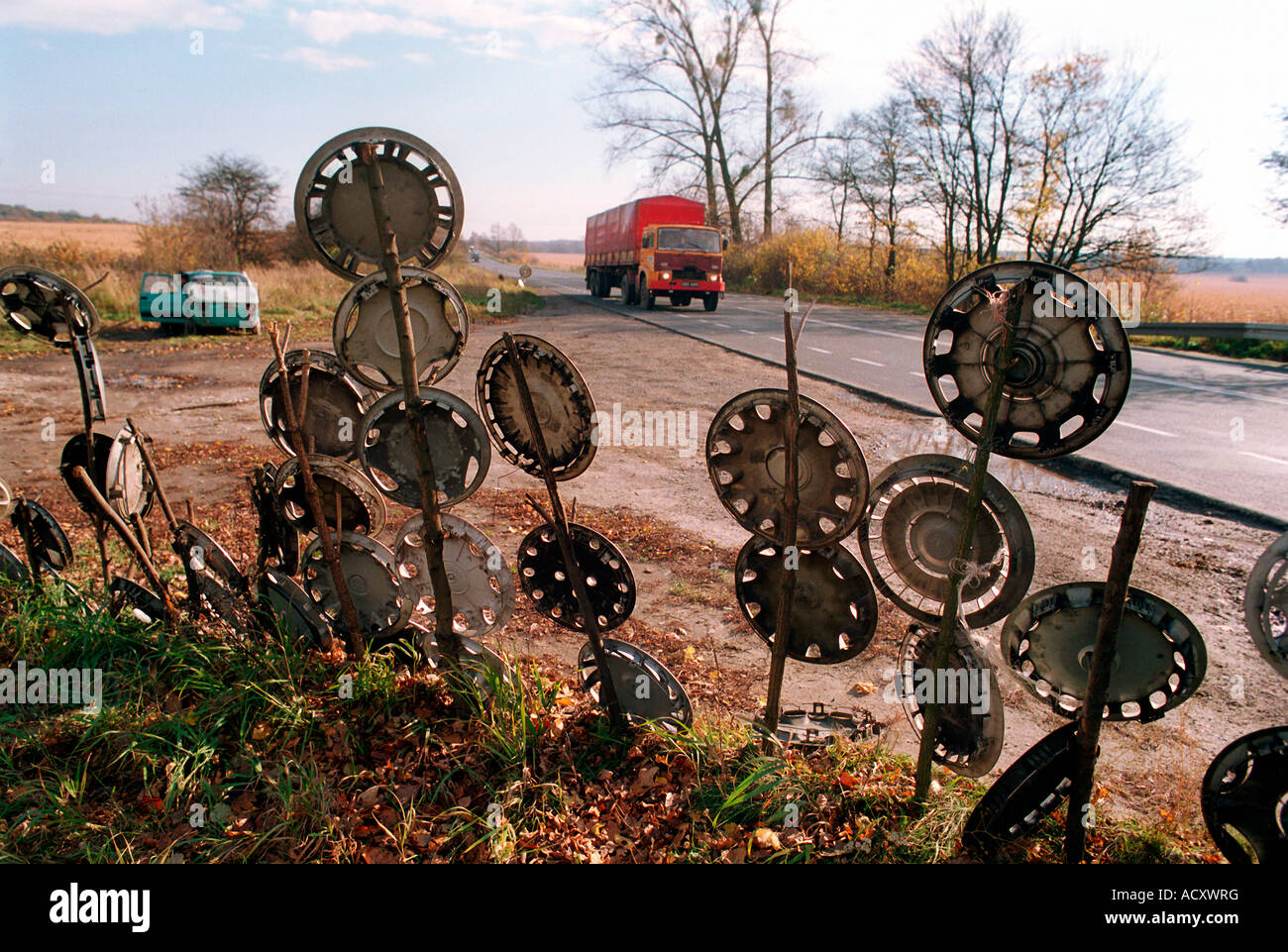 The sale of hub caps on a roadside, Poland Stock Photo - Alamy