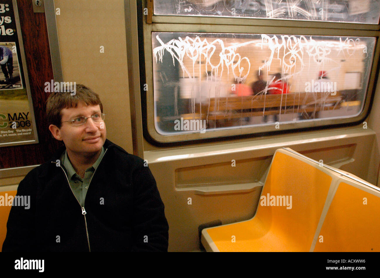 Commuter on New York City Subway car Stock Photo - Alamy