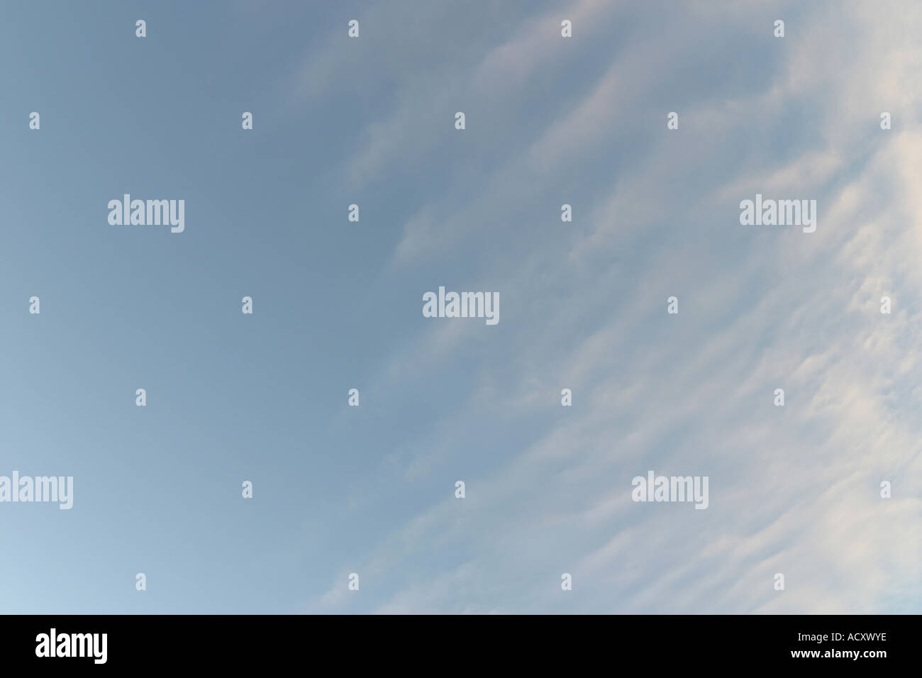 Pale Blue Sky wispy clouds Stock Photo - Alamy