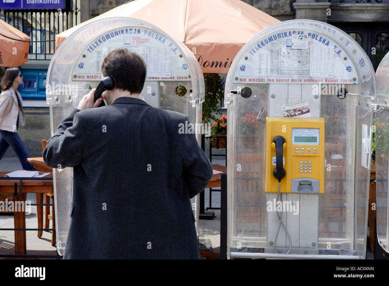 Phone boxes in the Main Market Square in Cracow, Poland Stock Photo - Alamy
