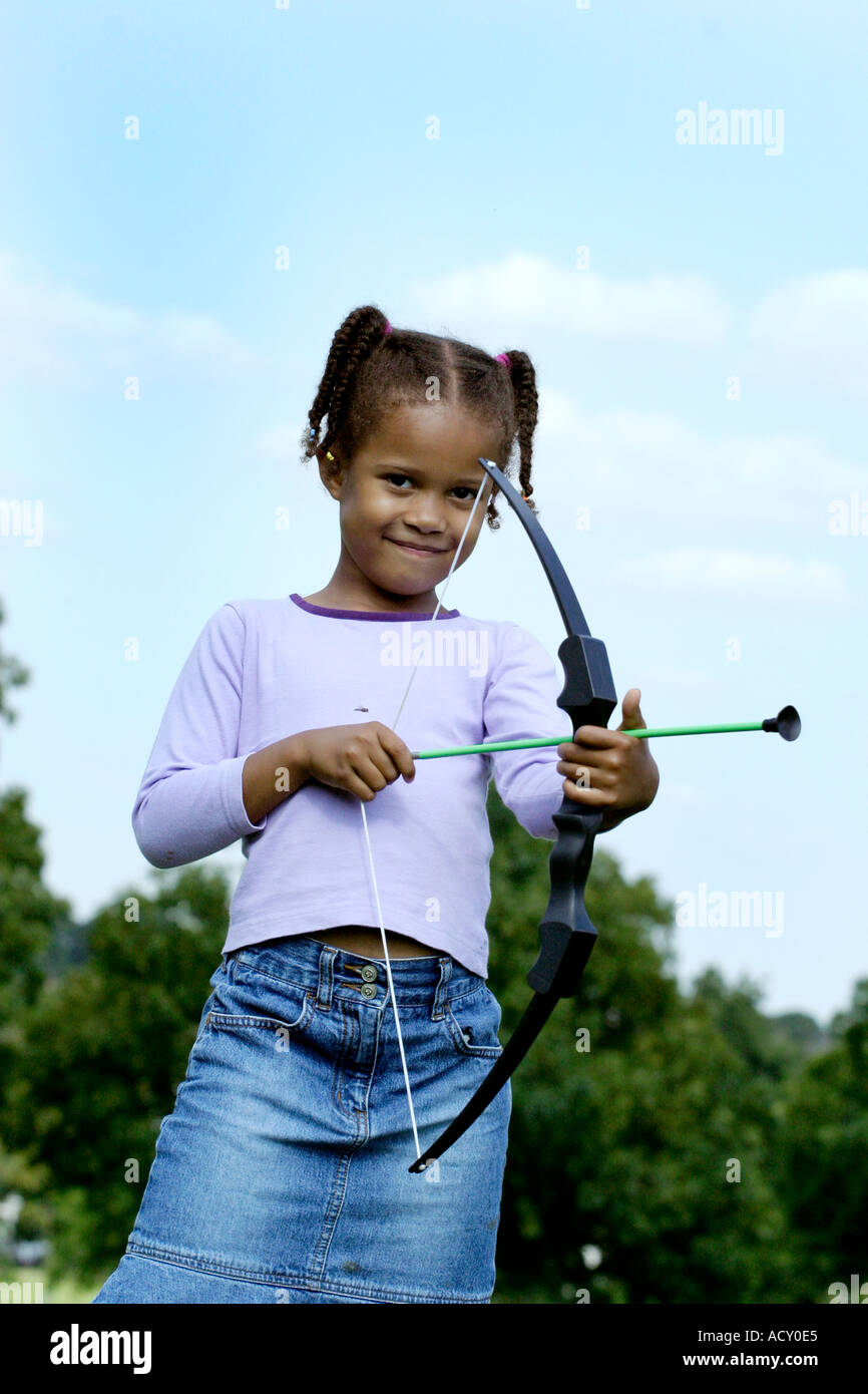 Girl with bow Stock Photo - Alamy