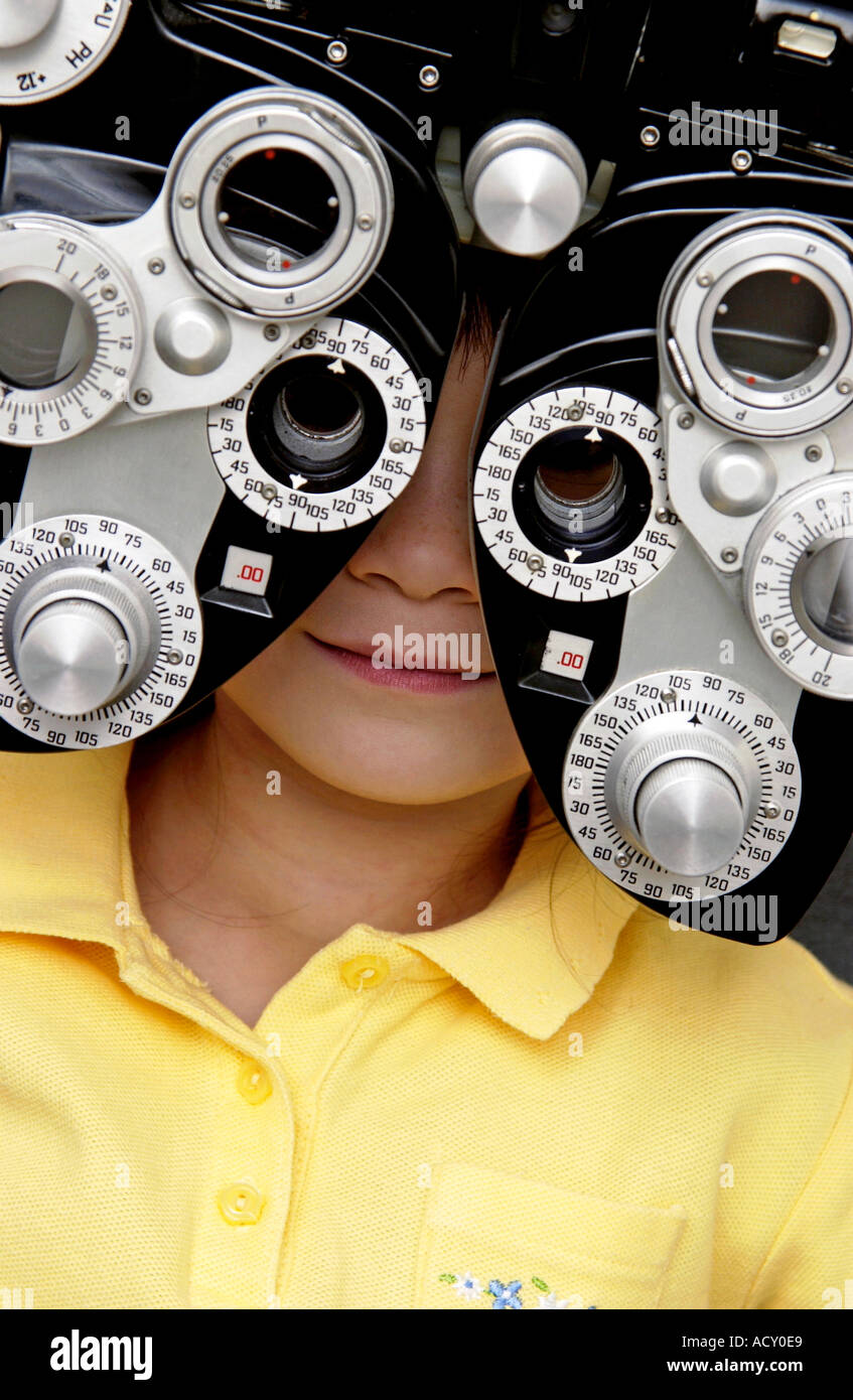 Girl getting vision tested Stock Photo - Alamy