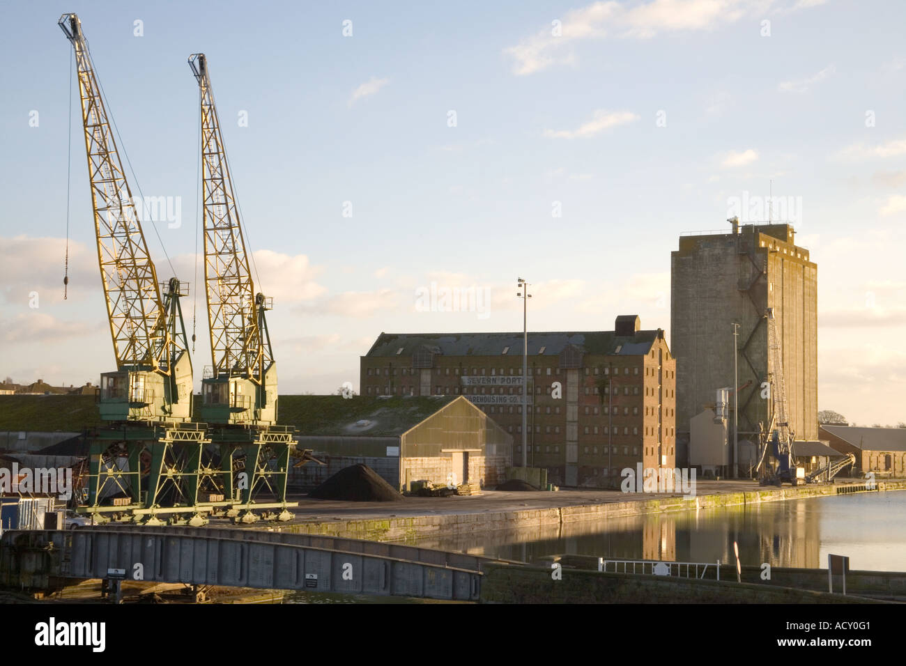 cranes at sharpness docks on the banks of the river severn in ...