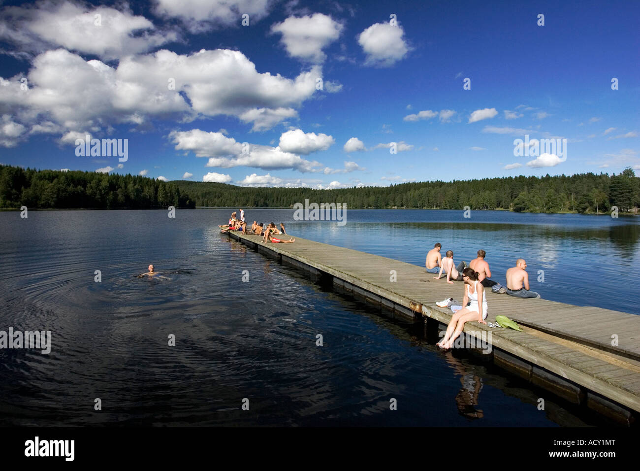 Tourists on a jetty at the Sognsvann lake, Norway Stock Photo - Alamy