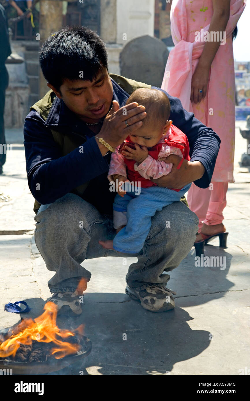 Father blessing his child.Swayambhunath Stupa.Kathmandu.Nepal Stock ...