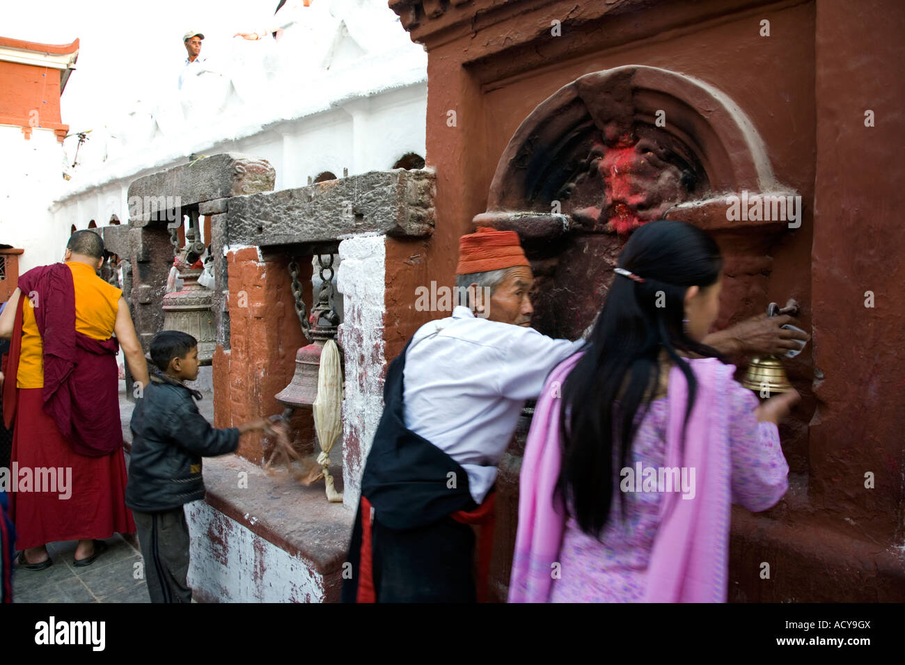 Pilgrims worshipping at Ajima Shrine.Bodhnath Stupa.Kathmandu Valley ...