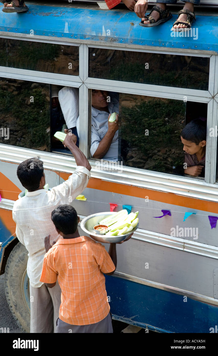 Men selling cucumbers. Bus stop. Butwal. Nepal Stock Photo - Alamy