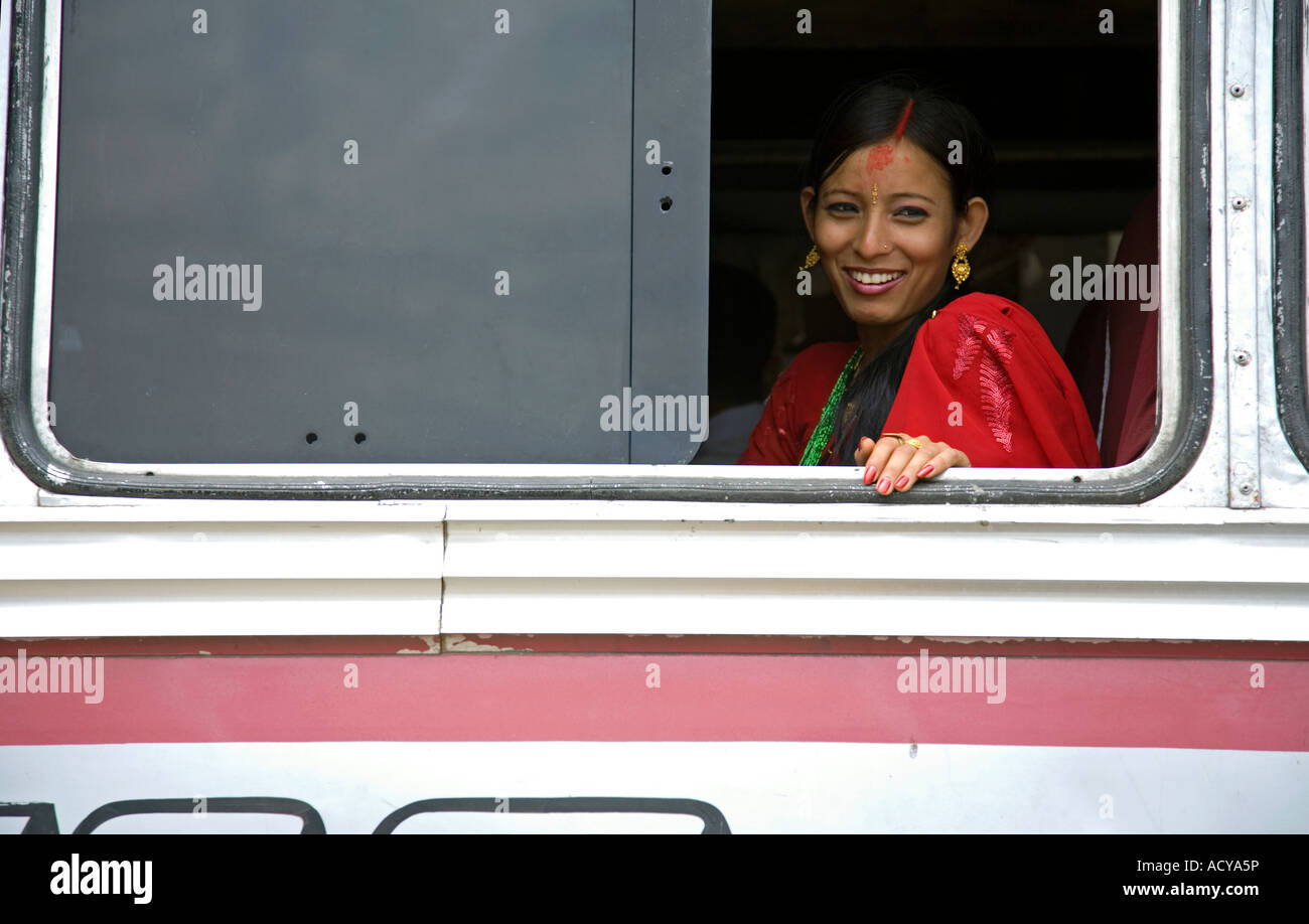 Nepali woman smiling through the window. Bus stop. Butwal. Nepal Stock ...