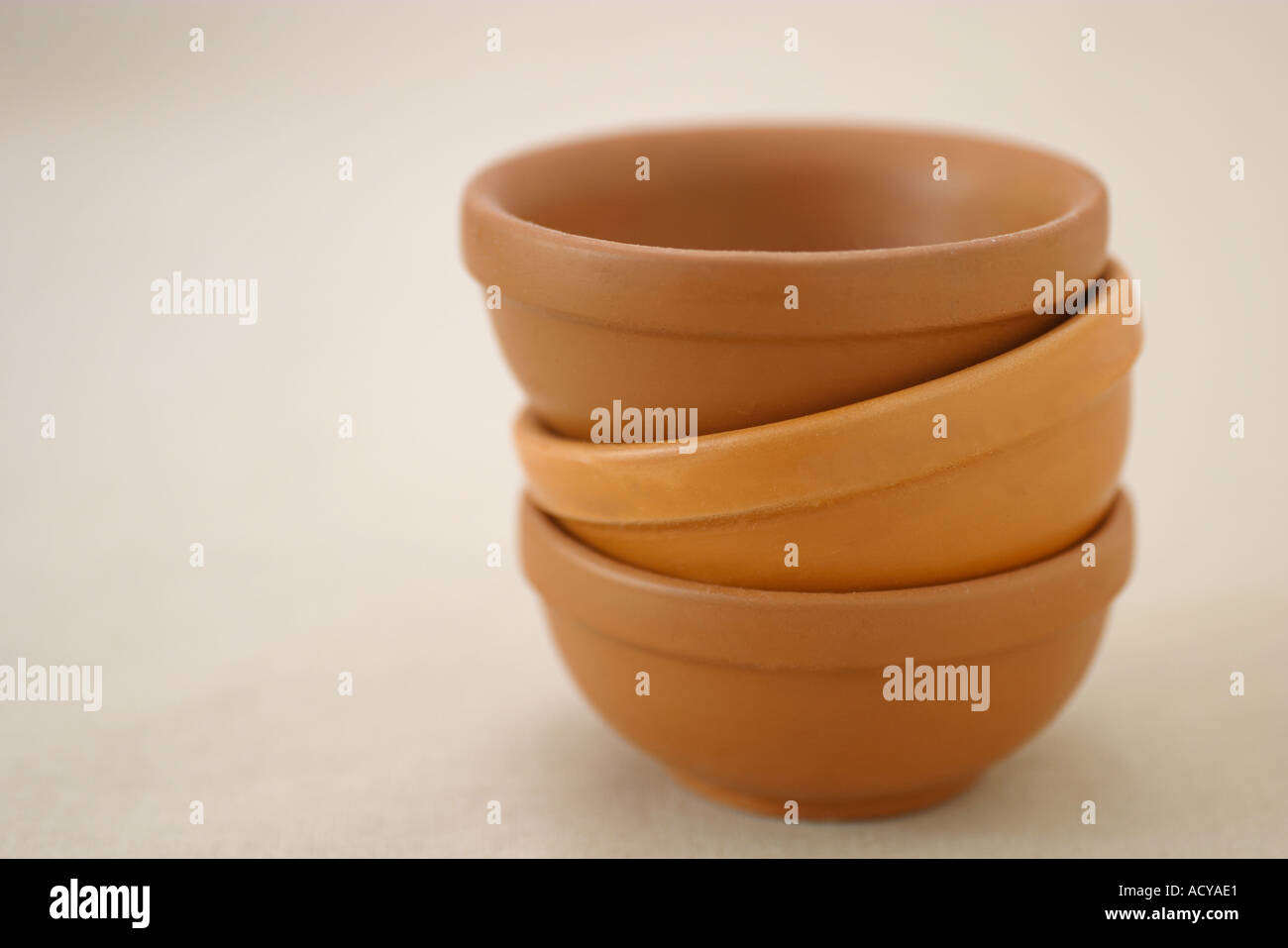 Pile of three clay bowls Stock Photo - Alamy