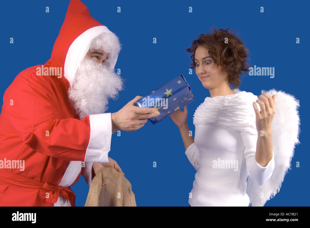 Giving angel hi-res stock photography and images - Alamy