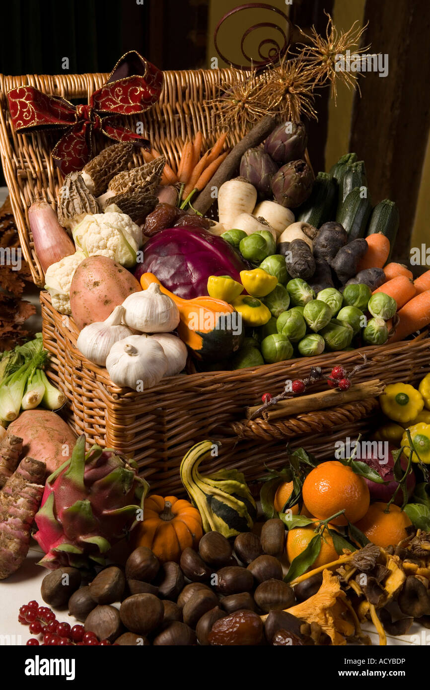 Christmas themed wicker food hamper filled to the brim with vegetables ...