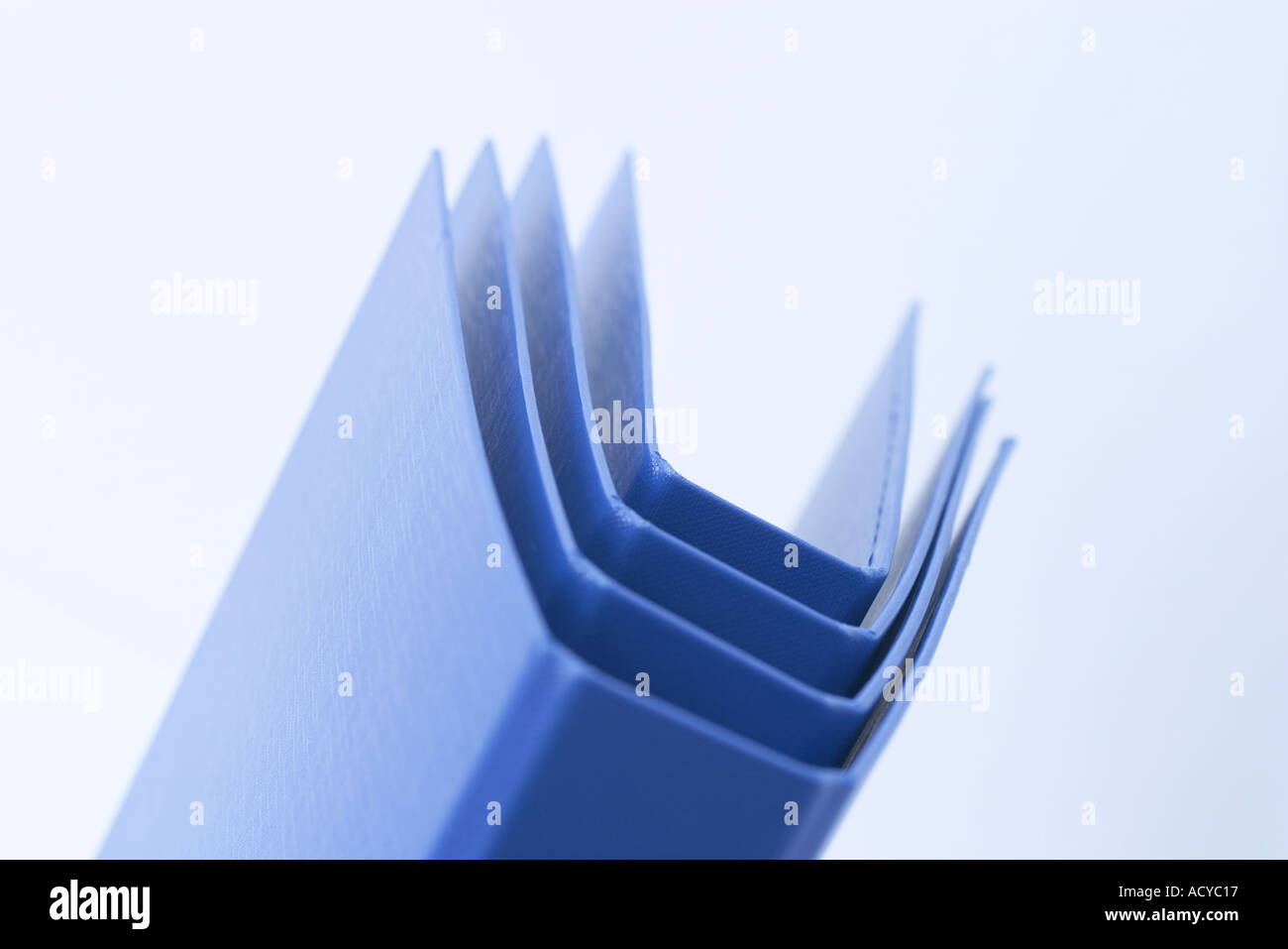 Four Blue Office Folders Stock Photo - Alamy