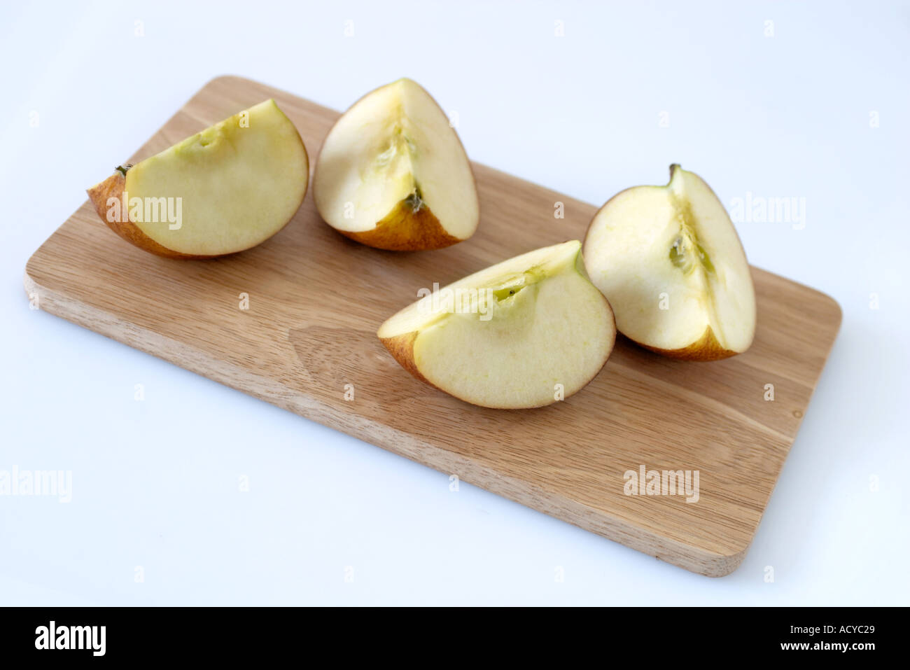 Apple cut into quarters hi-res stock photography and images - Alamy
