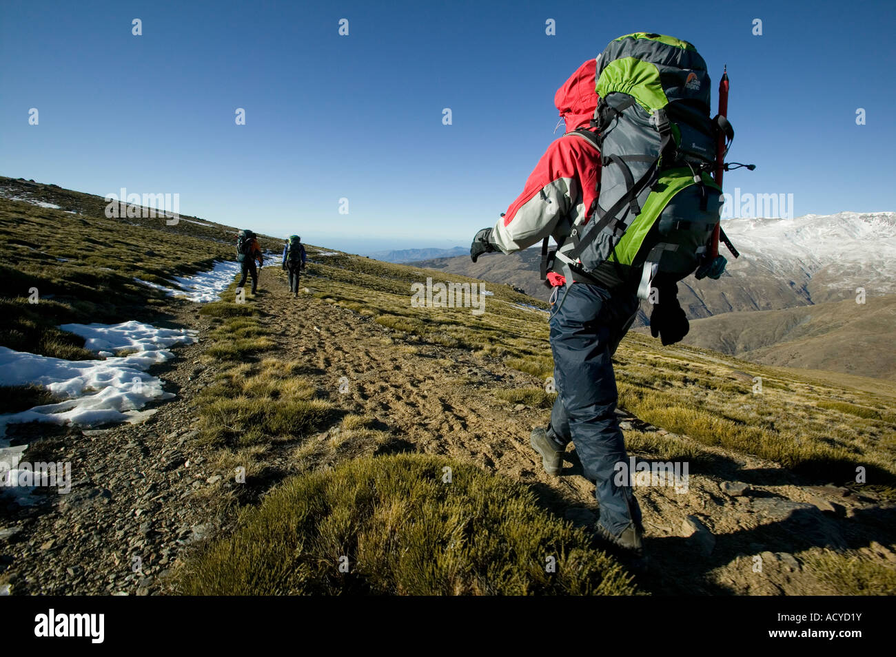 Backpackers hiking in the Sierra Nevada Spain Stock Photo - Alamy