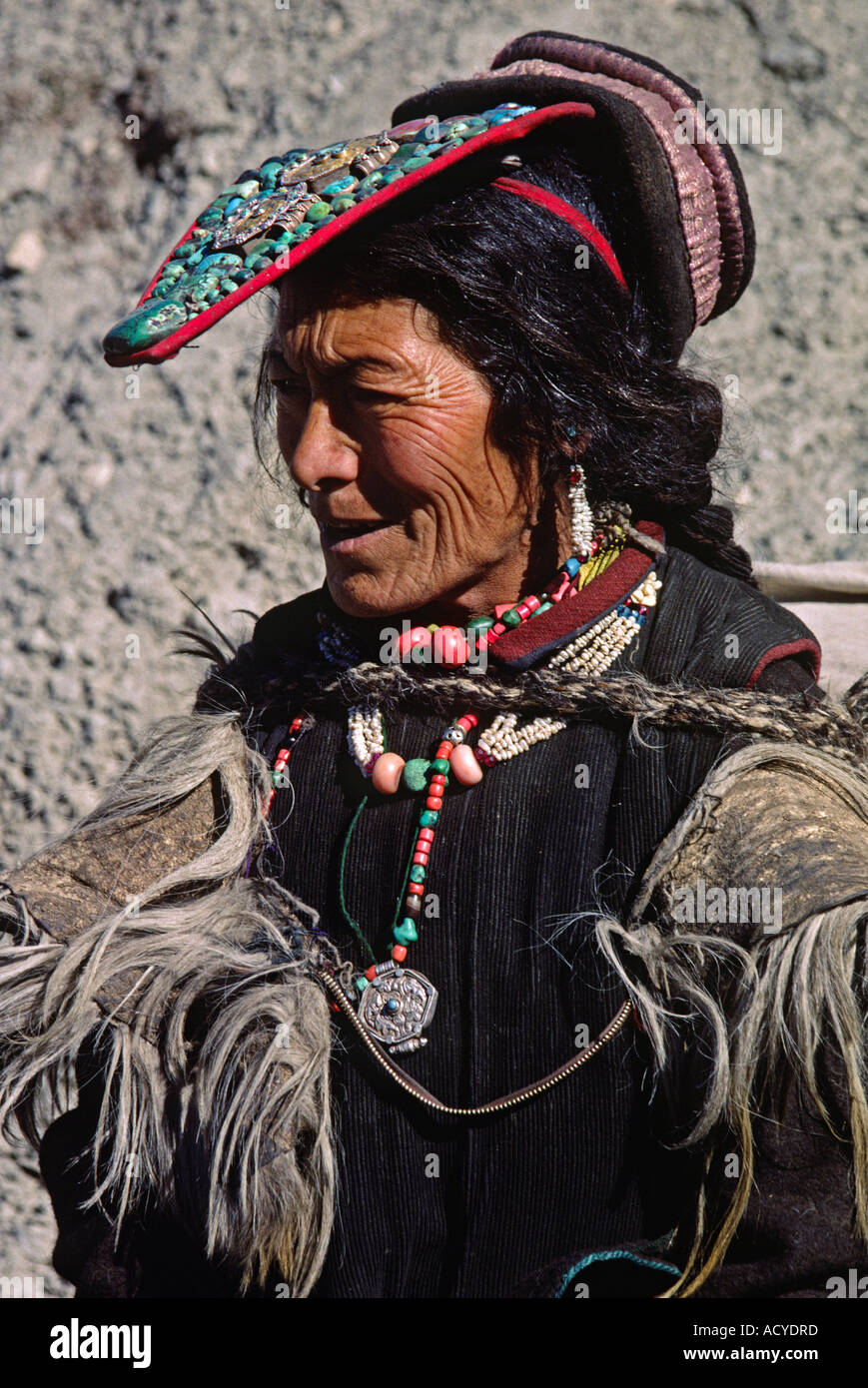 LADAKHI WOMAN wearing sheepskin chuba and PERAK adorned with TURQUOISE ...